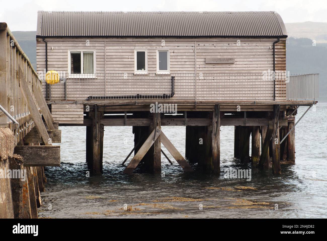 Salen pier, Salen, Mull, Scotland with holiday let building Stock Photo ...