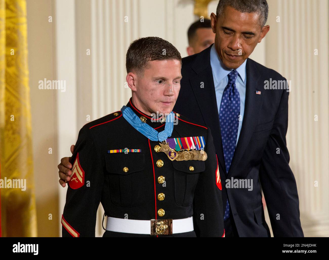President Barack Obama reaches out to retired Marine Cpl. William "Kyle ...