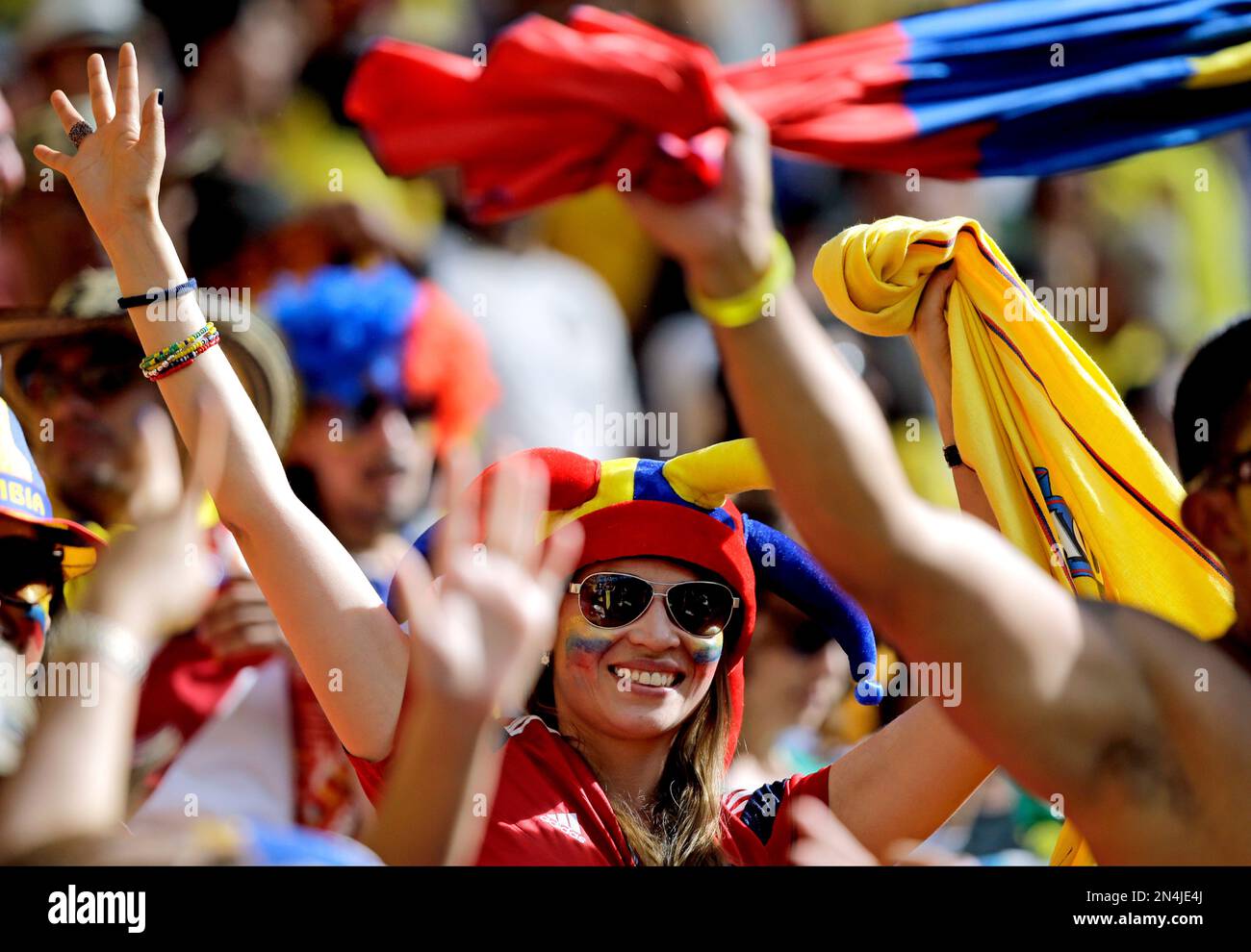 Colombian supporters celebrate after the group C World Cup soccer match ...