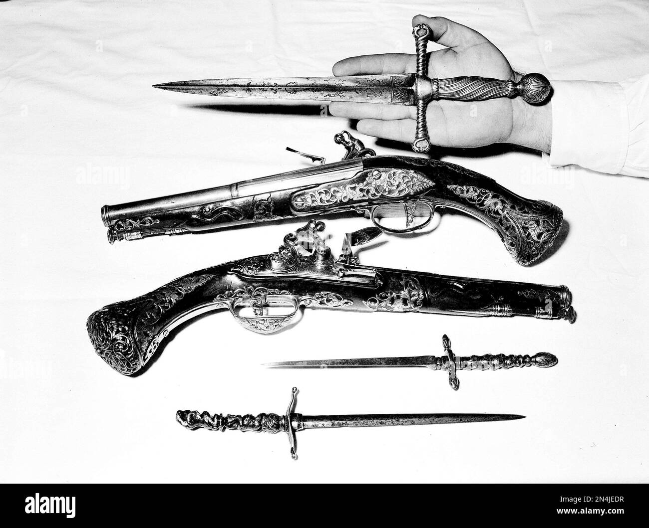 Seventeenth century weapons are pictured from the antique gun ...