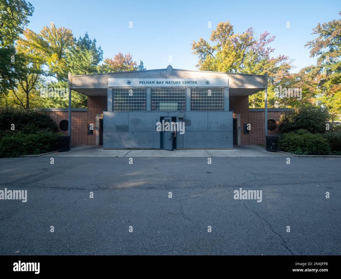 A man coming out of the Pelham Bay Nature Center building in Bronx, New ...