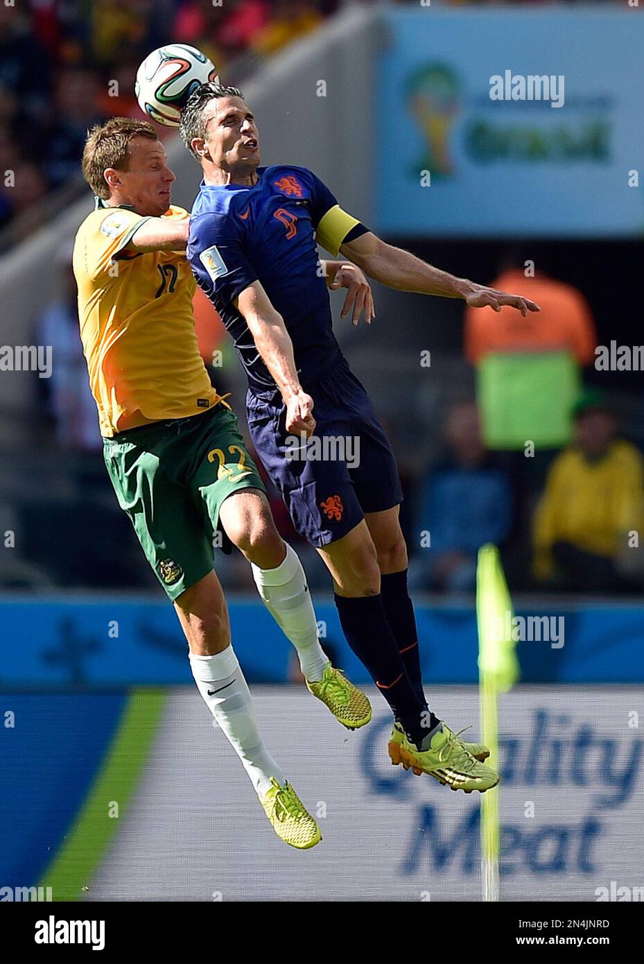 Australia's Alex Wilkinson, left, and Netherlands' Robin van Persie ...