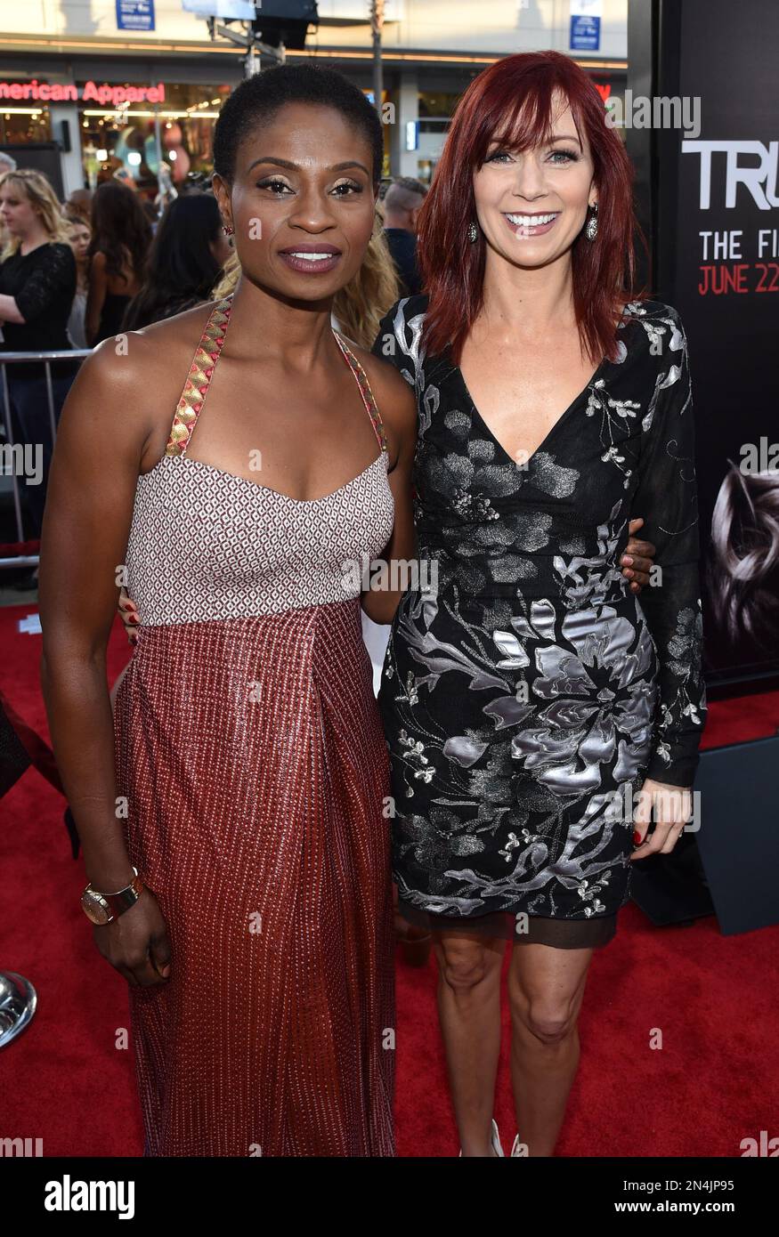Adina Porter, left, and Carrie Preston arrive at the Los Angeles ...