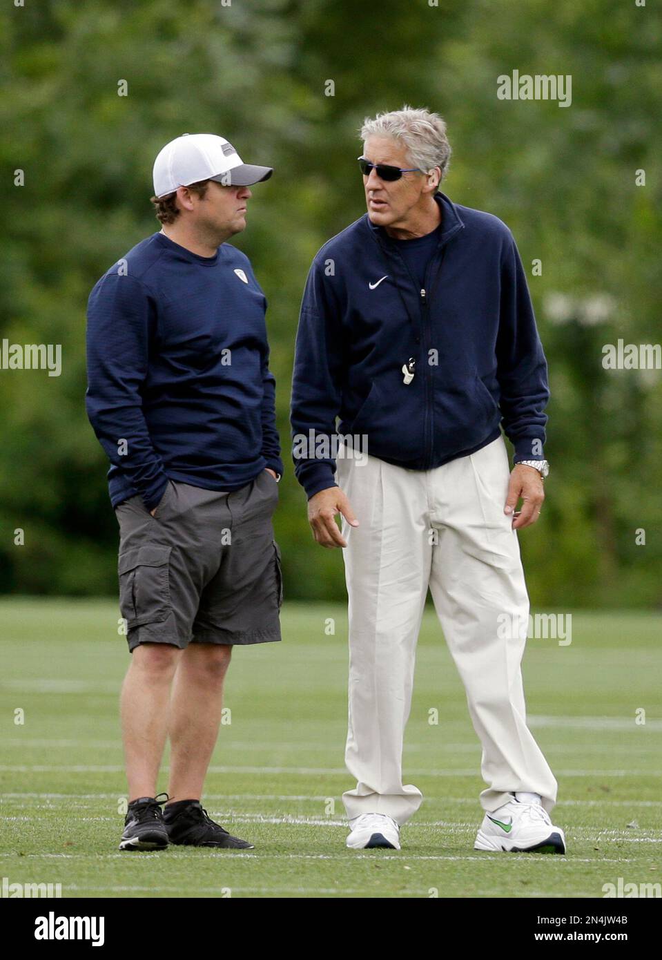 Seattle Seahawks general manager John Schneider, left, and head coach ...