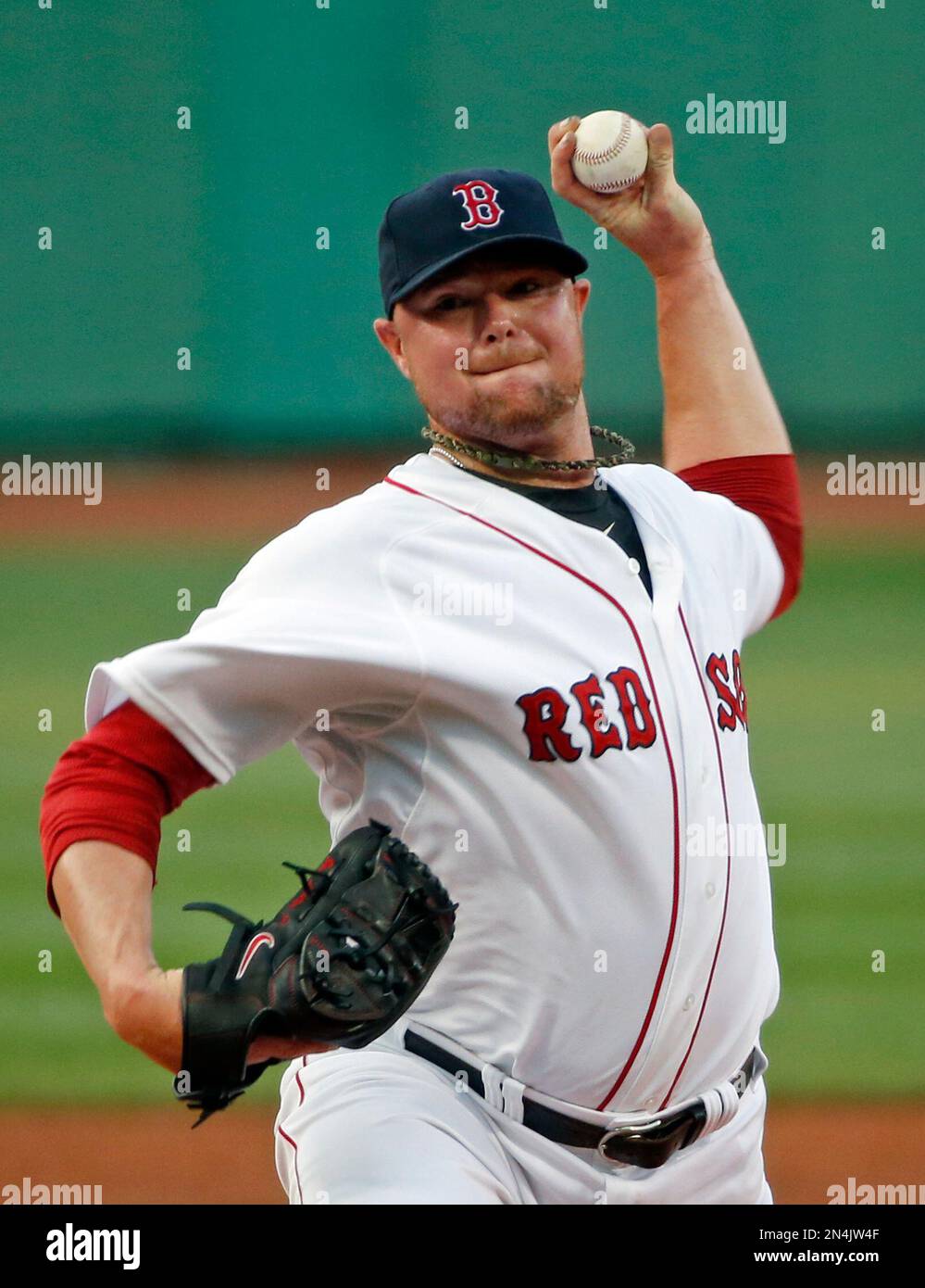 Boston Red Sox starting pitcher Jon Lester throws one in against the ...