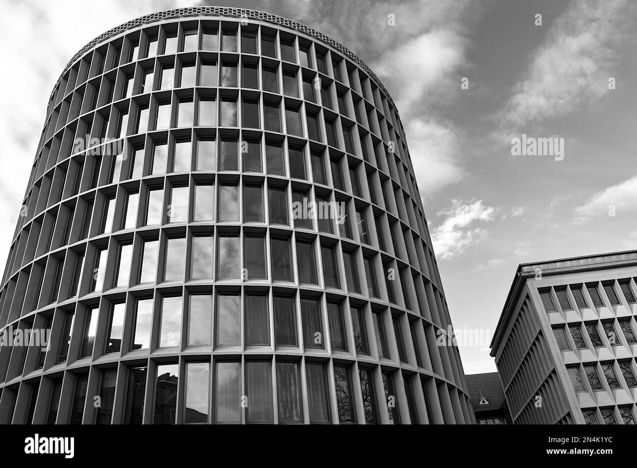 historic, modernist building in the shape of a cylinder in Poznan ...
