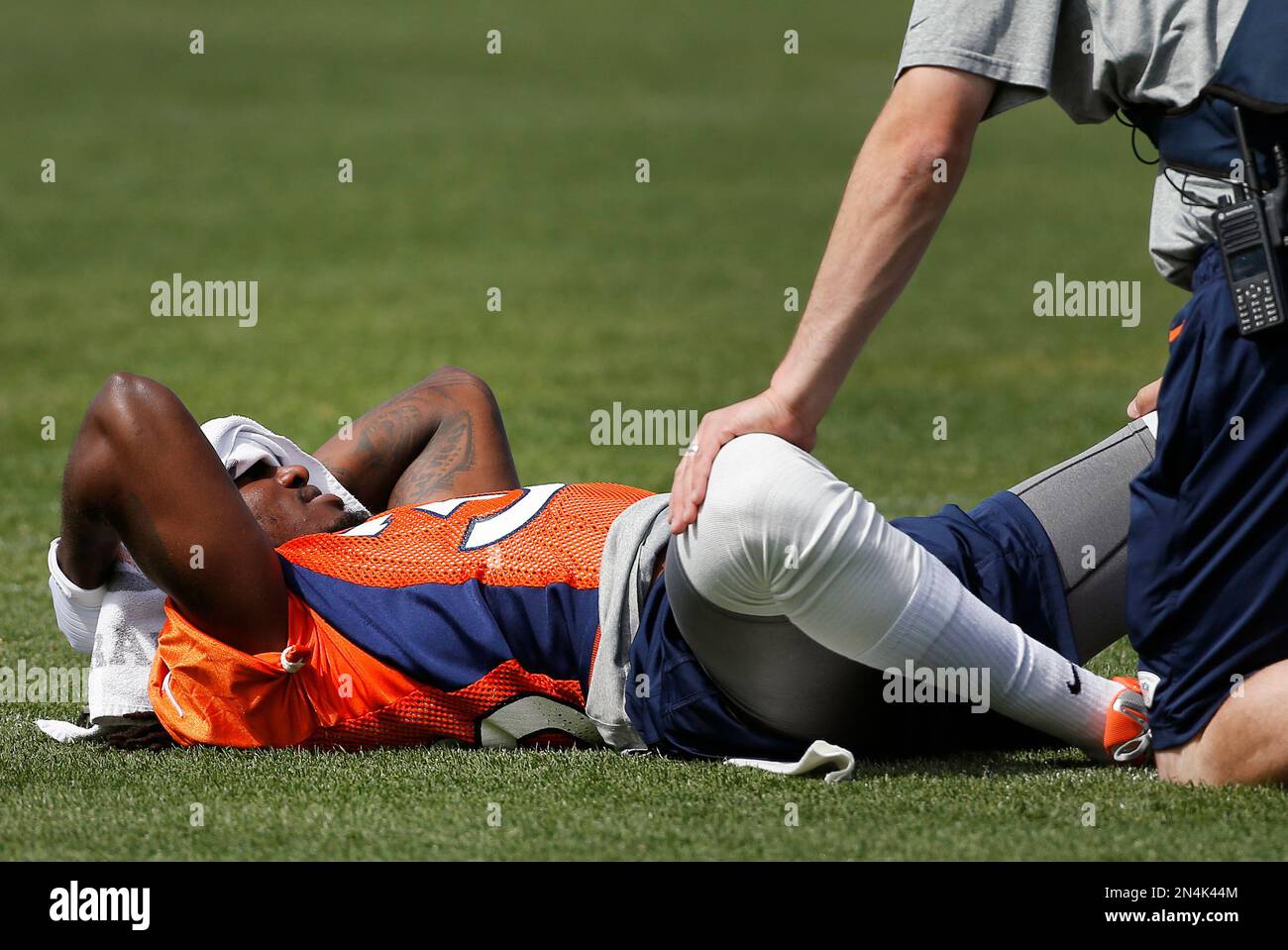 Denver Broncos safety Quinton Carter stretches before offseason ...