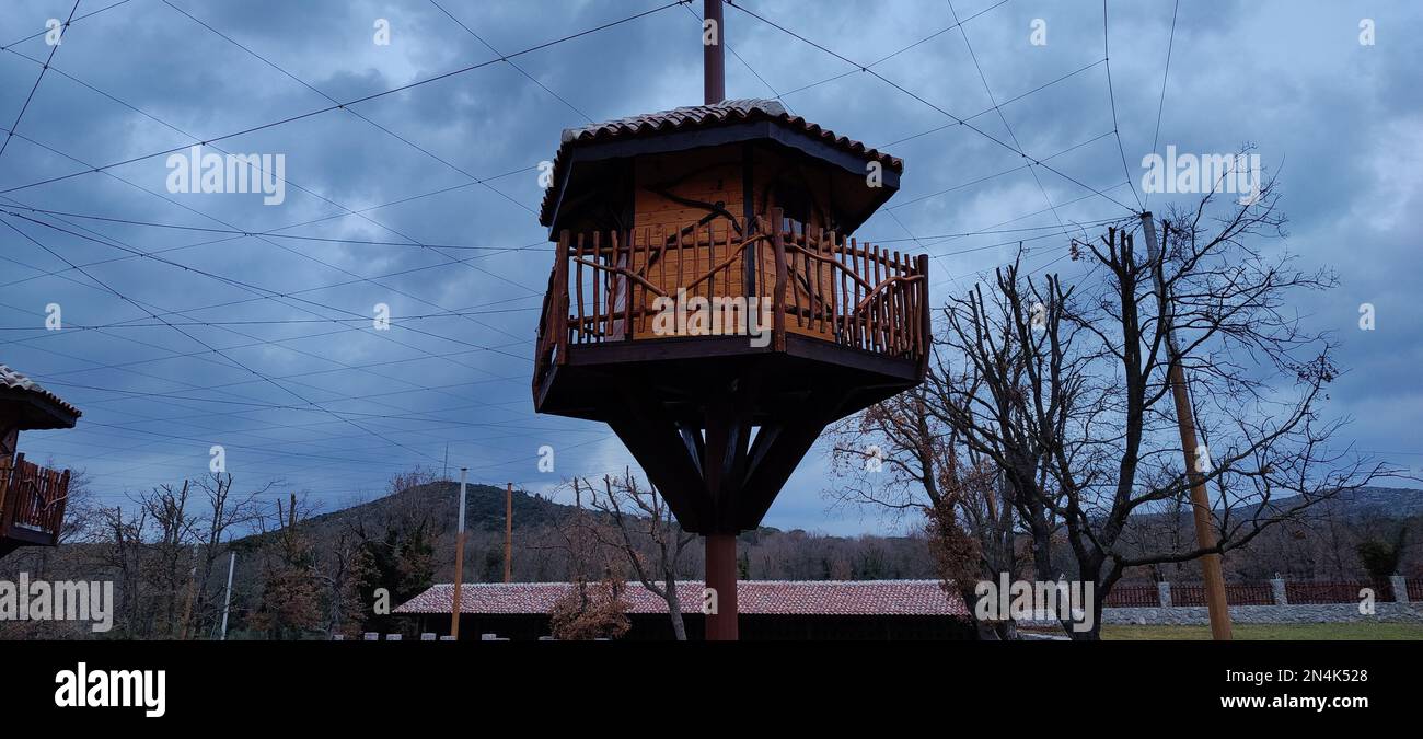 A strange tiny wooden house on the pole near the street Stock Photo - Alamy