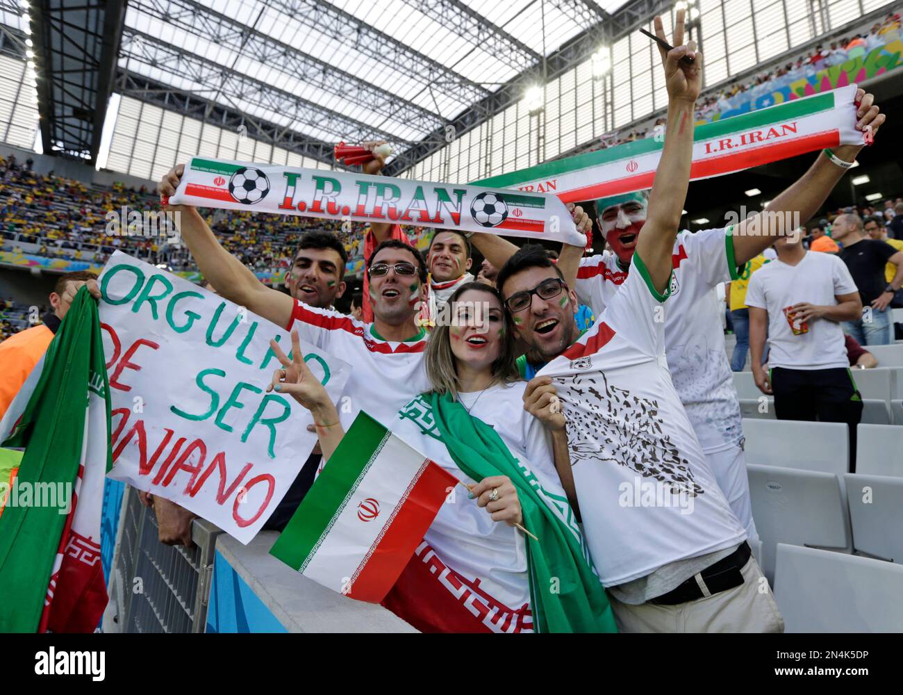 Iranian supporters react before the group F World Cup soccer match ...