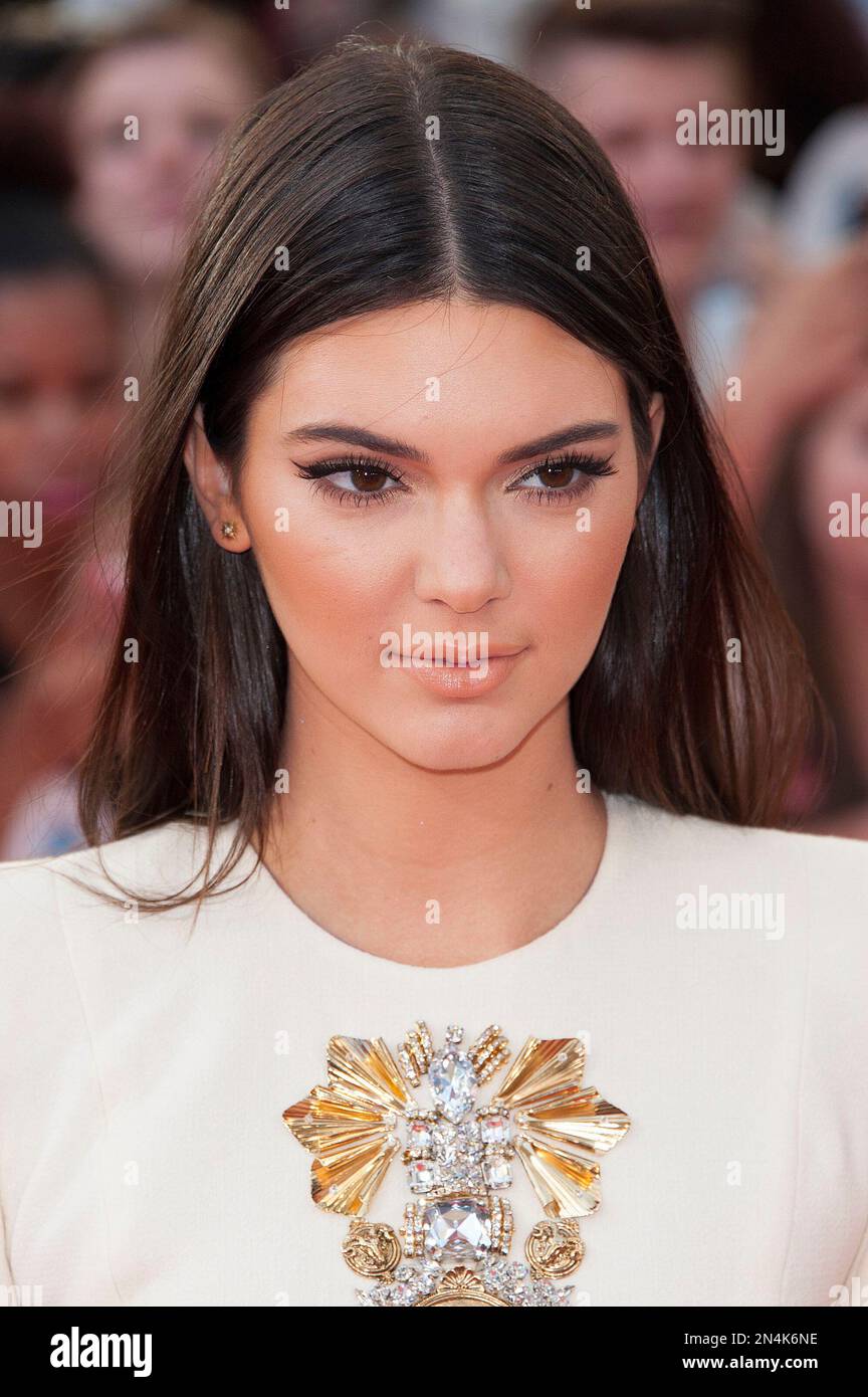 Kendall Jenner poses for a photo on the red carpet during the 2014 ...