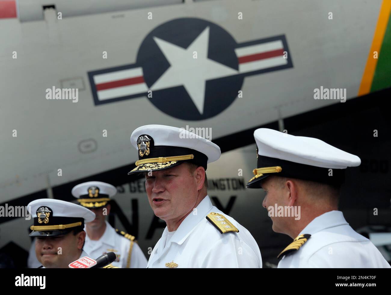 Rear Adm. Mark Montgomery, second from right, of Commander, Battle ...