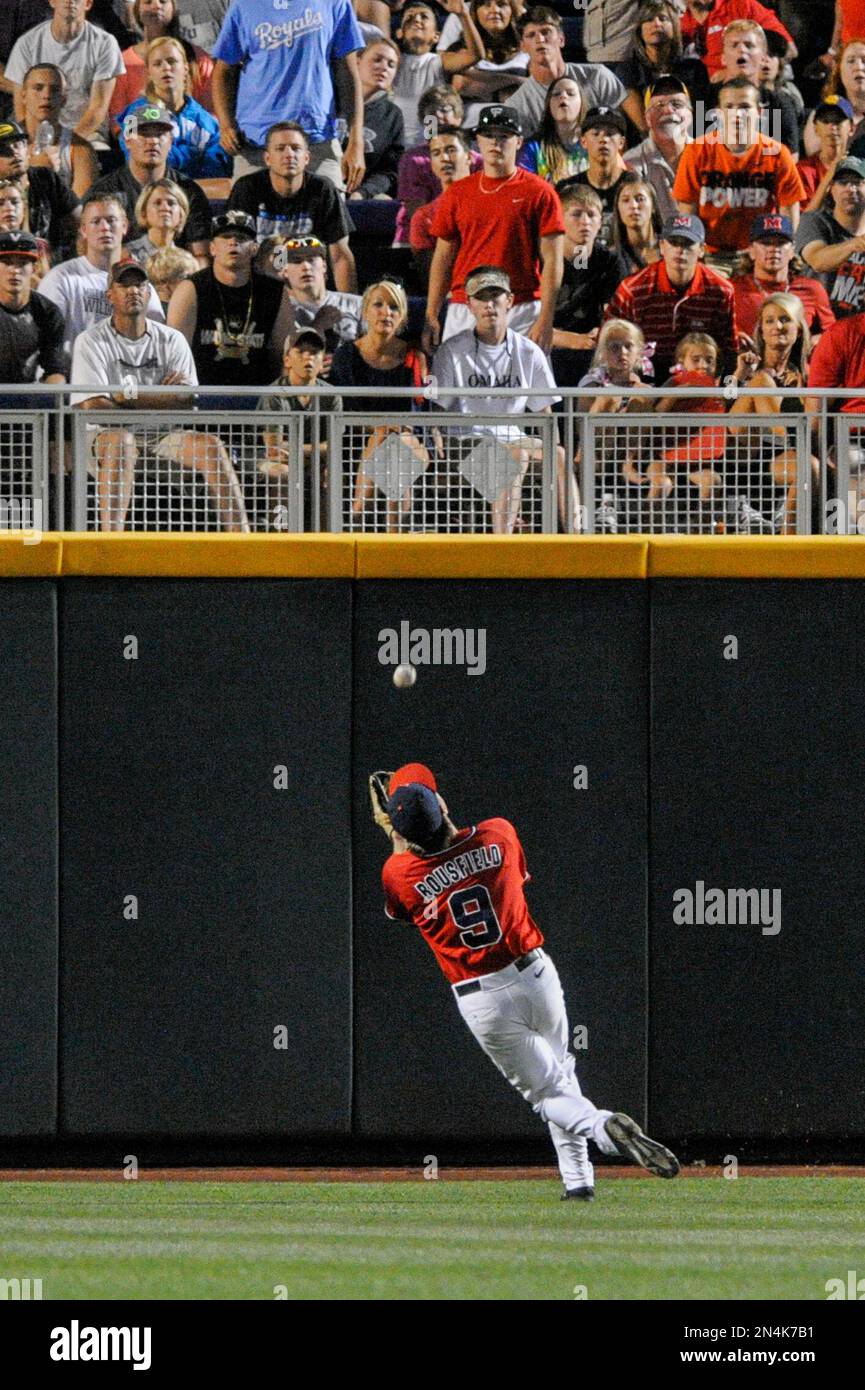 Mississippi center fielder Auston Bousfield (9) catches a fly ball hit ...