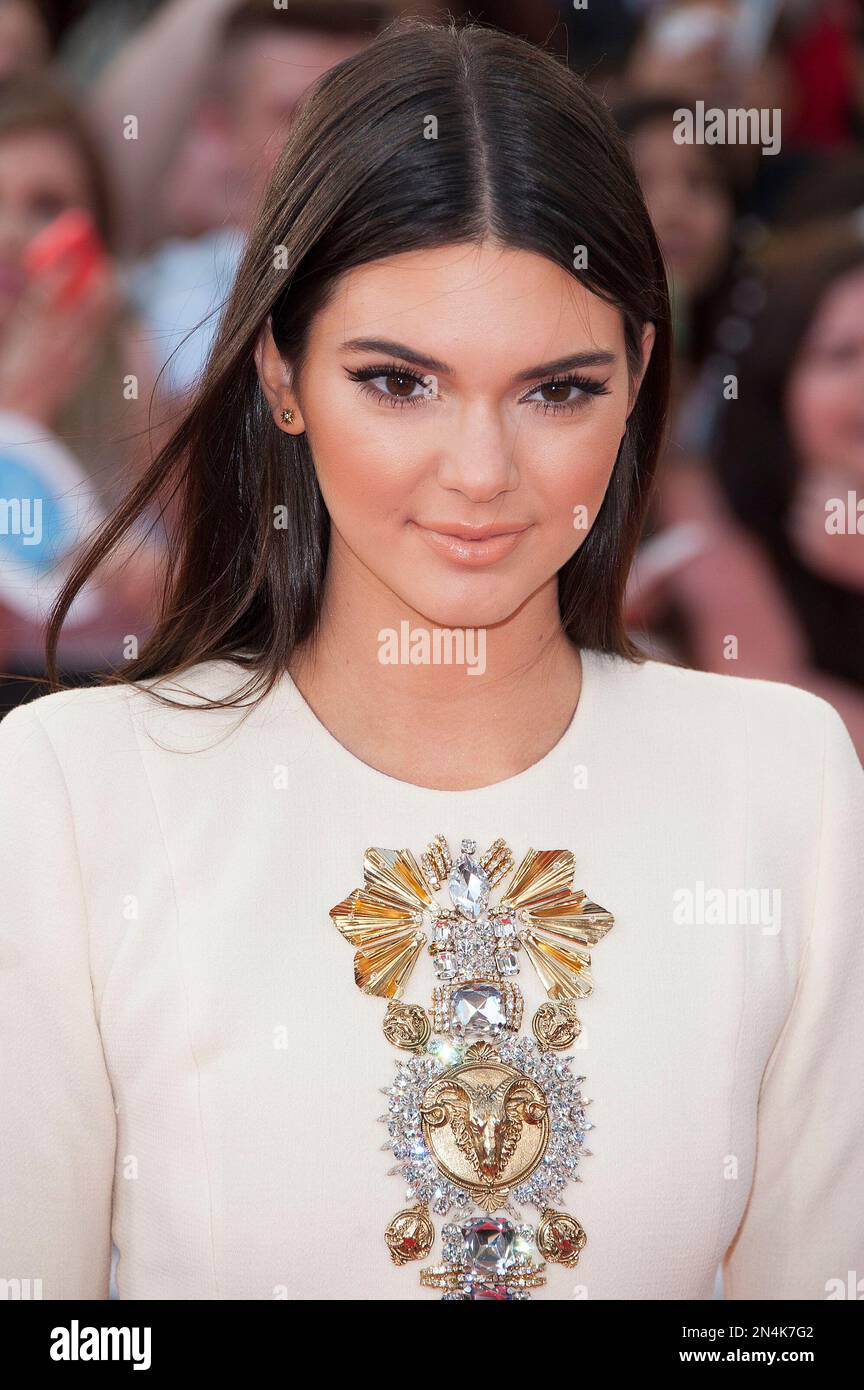 Kendall Jenner poses for a photo on the red carpet during the 2014 ...