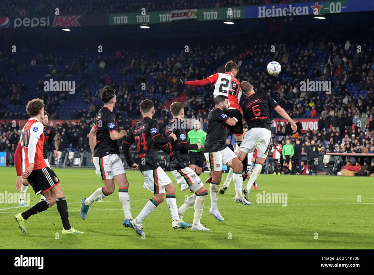 ROTTERDAM - Santiago Gimenez of Feyenoord (29), Joris Kramer of NEC Nijmegen (5) during the ...