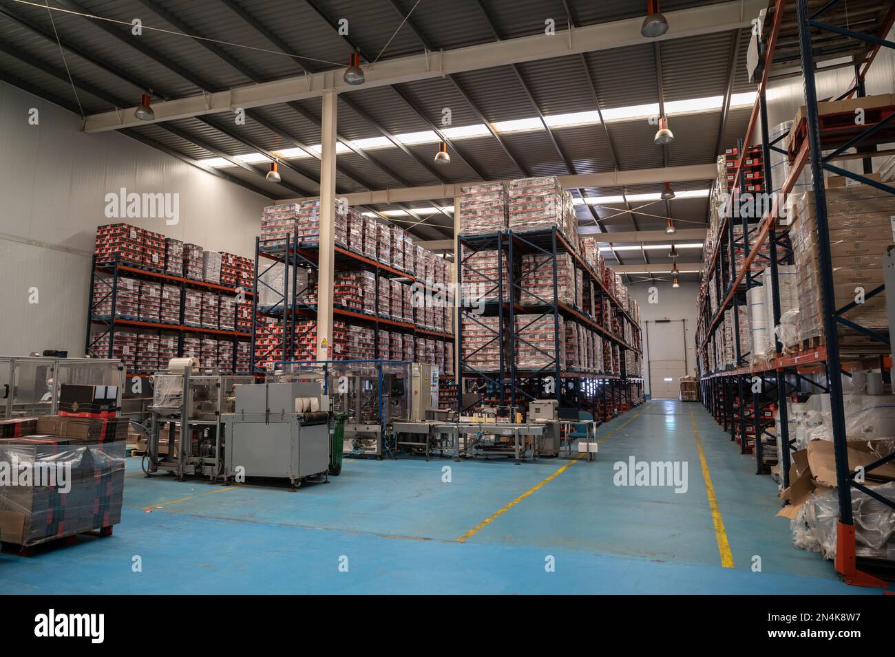 Warehouse shelves full of products, Fish canning factory (USISA), Isla ...