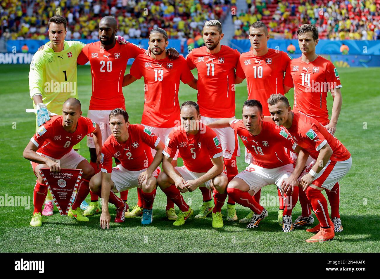 The Swiss team poses for a photo before the group E World Cup soccer ...