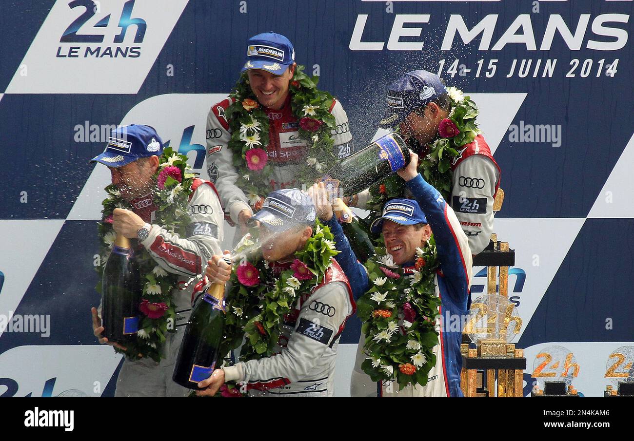 Audi Motorsports driver France's Benoit Treluyer, top, and Toyota ...