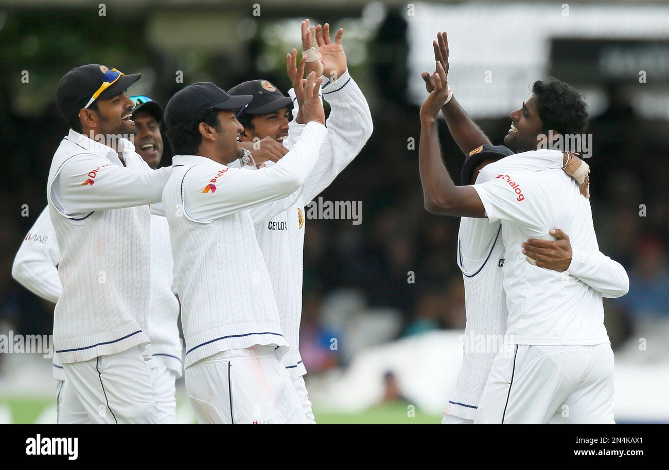 Sri Lanka's bowler Shaminda Eranga, right, celebrates with teammates ...
