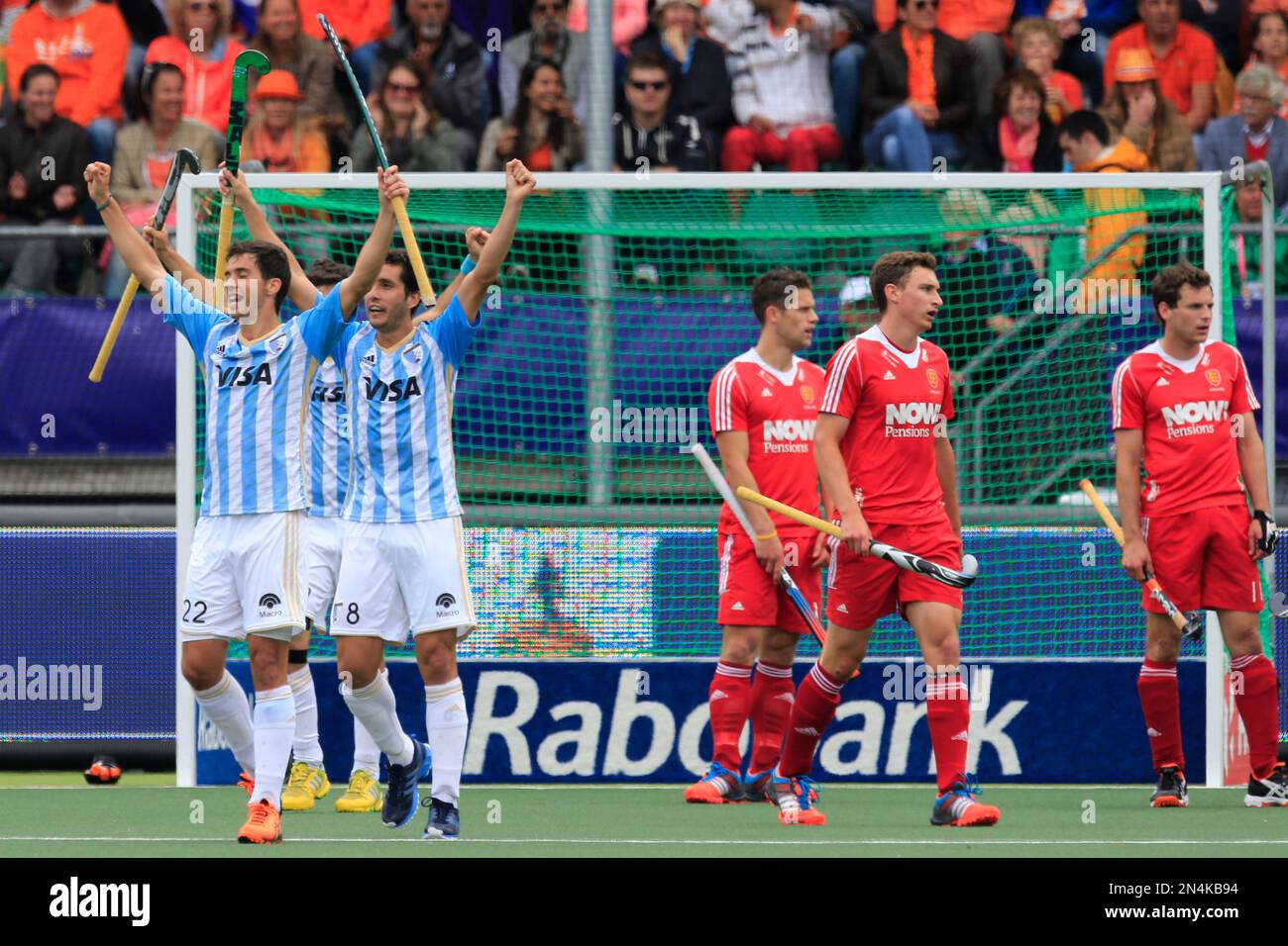 Argentina's Matias Rey, left, and Argentina's captain Lucas Rey, second ...