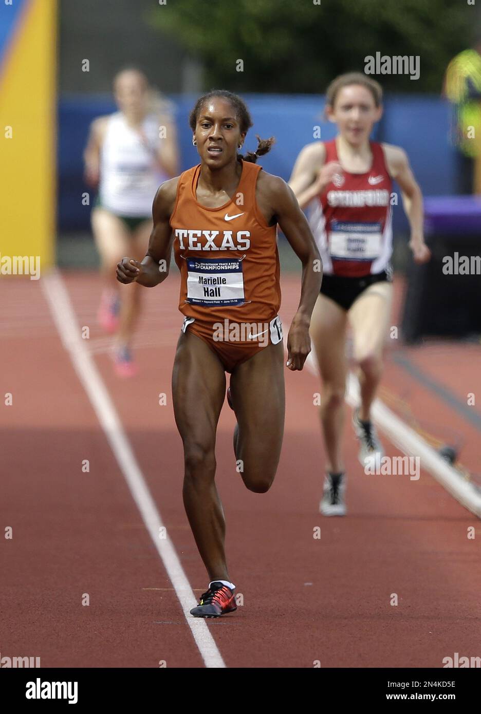Texas' Marielle Hall races to the finish line during the women's 5000 ...