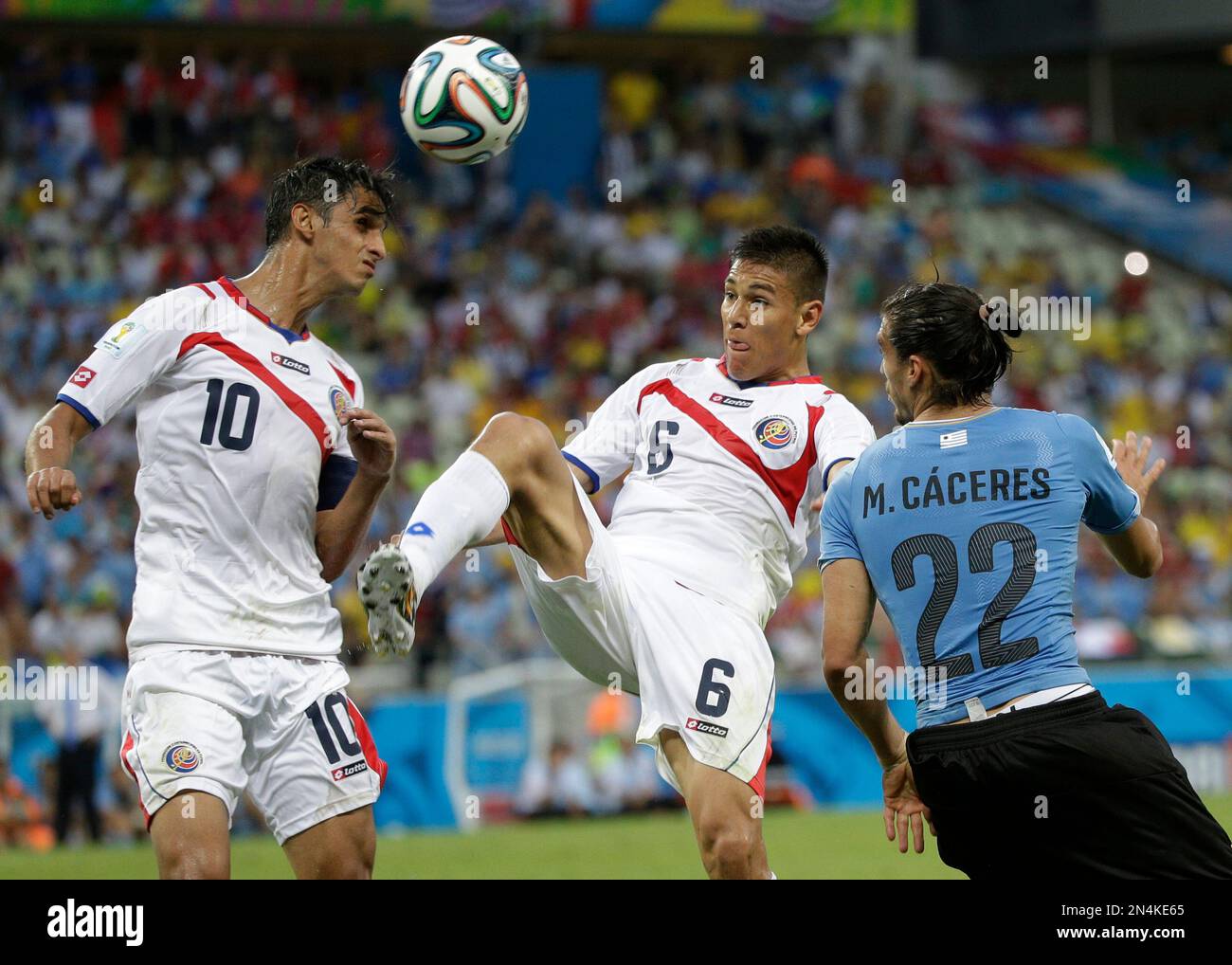 Costa Rica's Bryan Ruiz, left, and Costa Rica's Oscar Duarte clear the ...