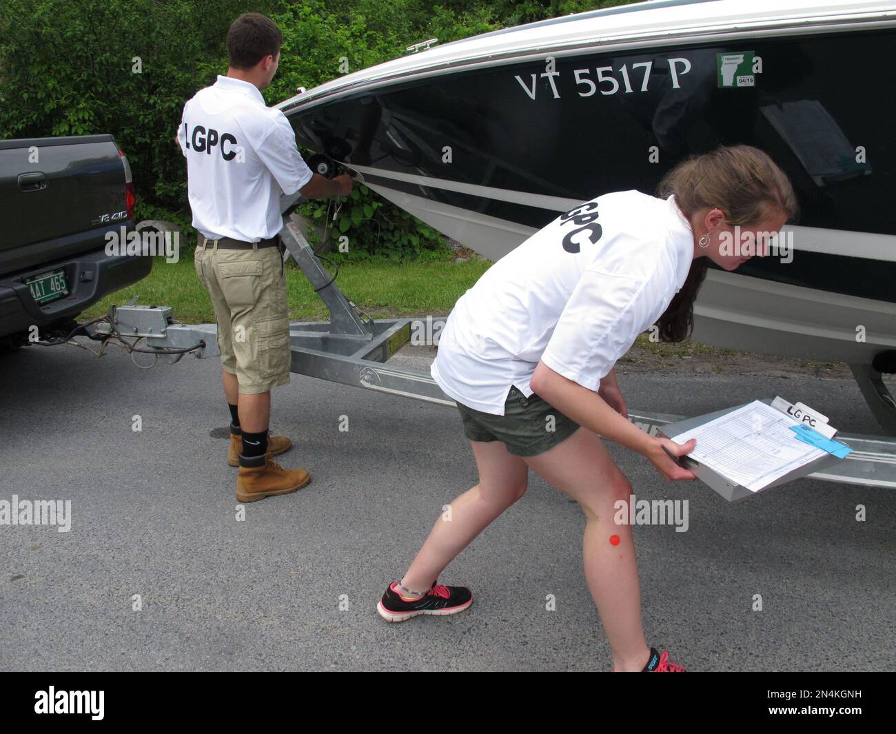 In this June 4, 2014 photo, Daniel Rahal, left, and Taylor Lee, boat ...