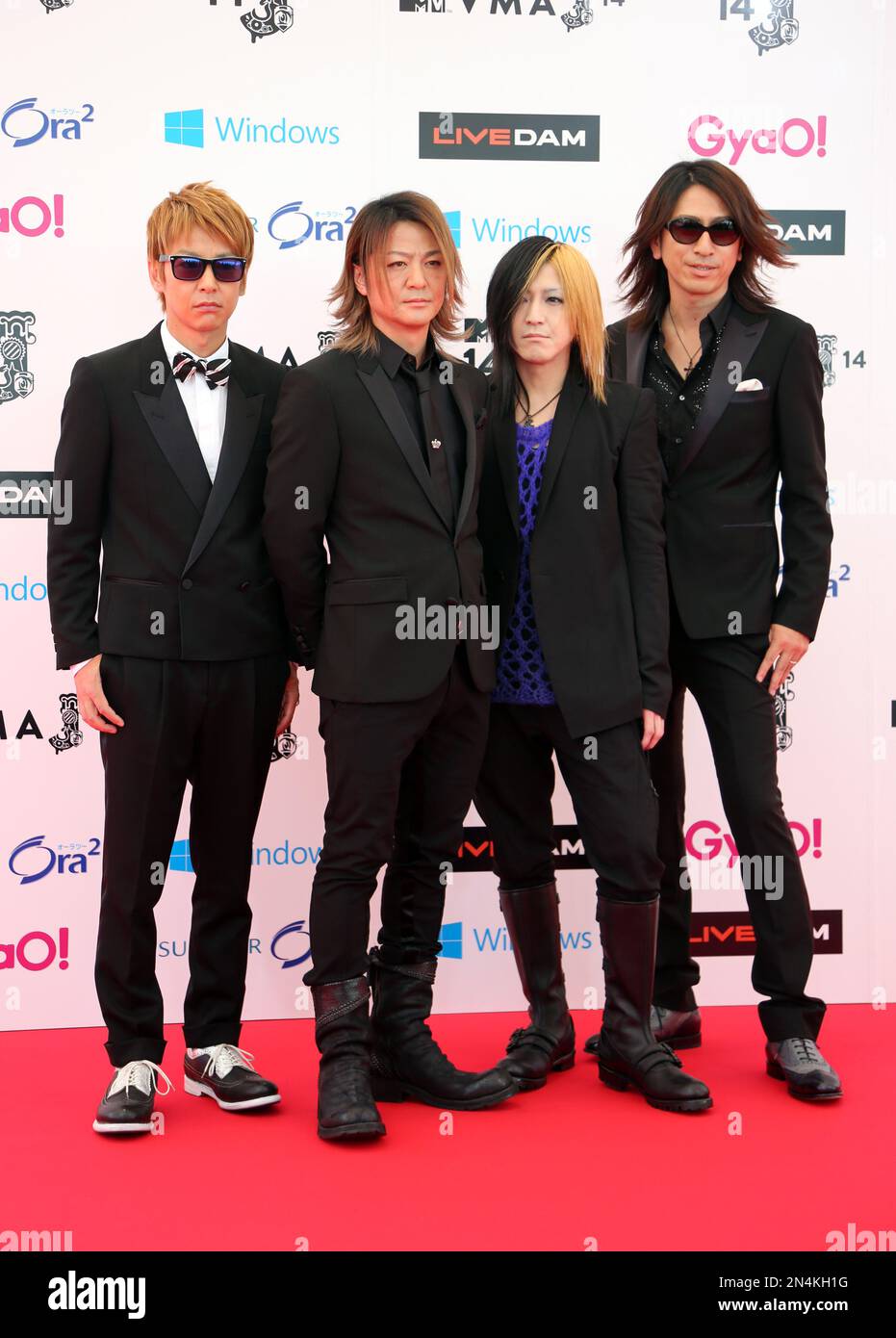 Members of Japanese rock band Glay, from left, Jiro, Teru, Hisashi and ...