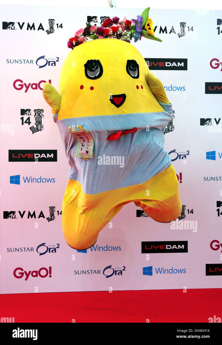 Japanese mascot character “Funassyi" jumps as he poses for ...