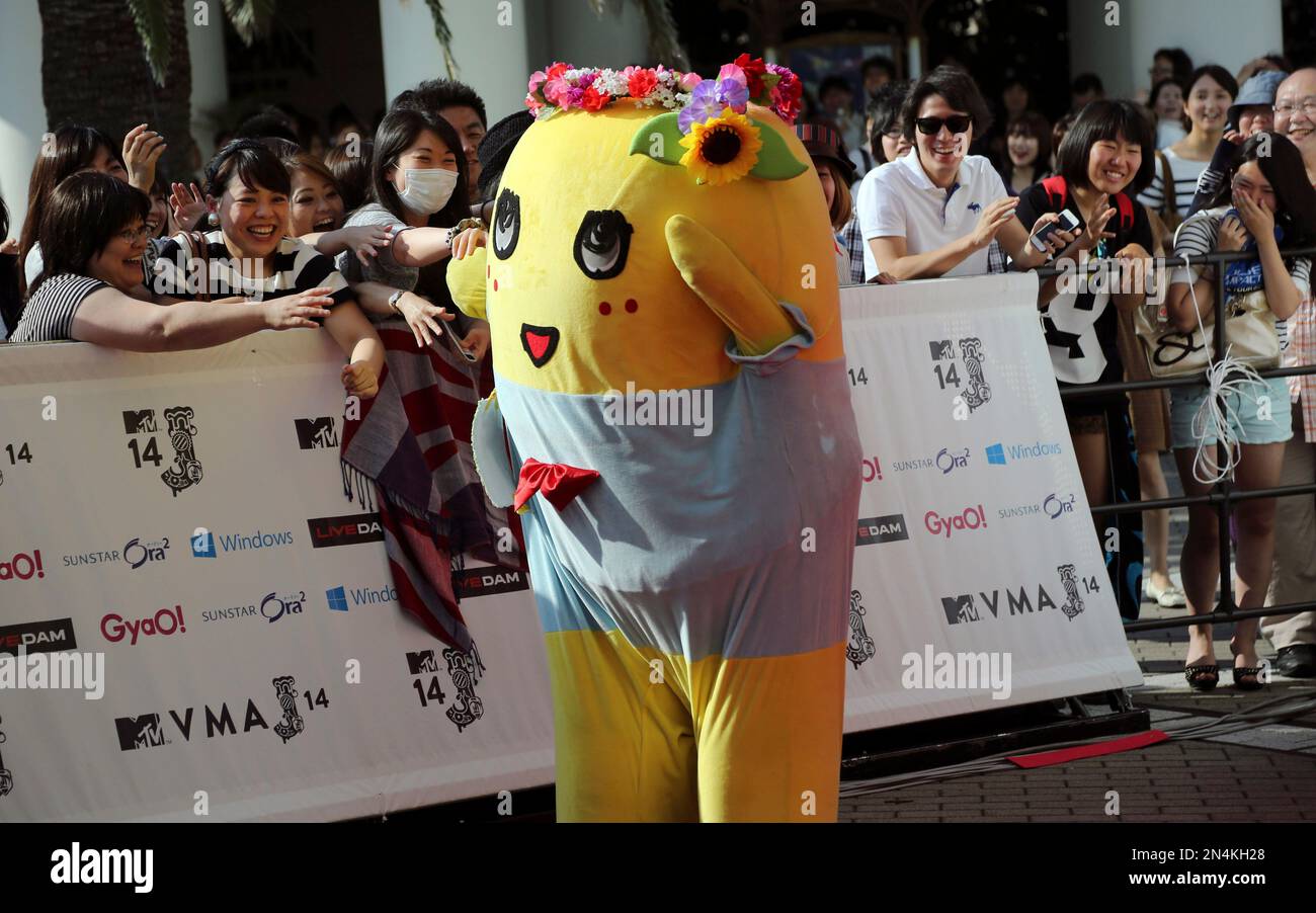 Japanese mascot character “Funassyi" greets the spectators on the red ...