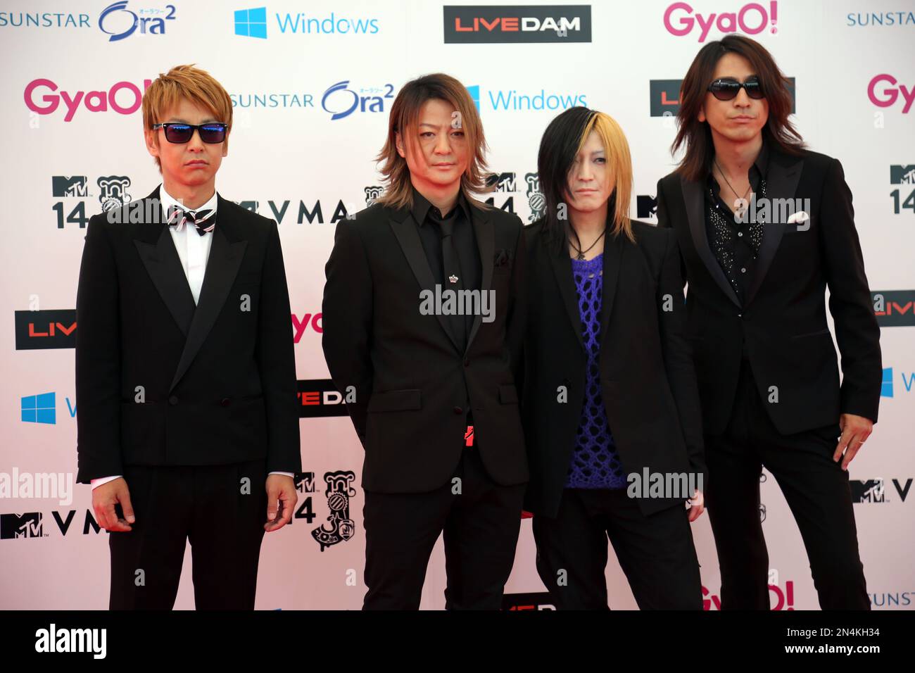 Members of Japanese rock band Glay, from left, Jiro, Teru, Hisashi and ...