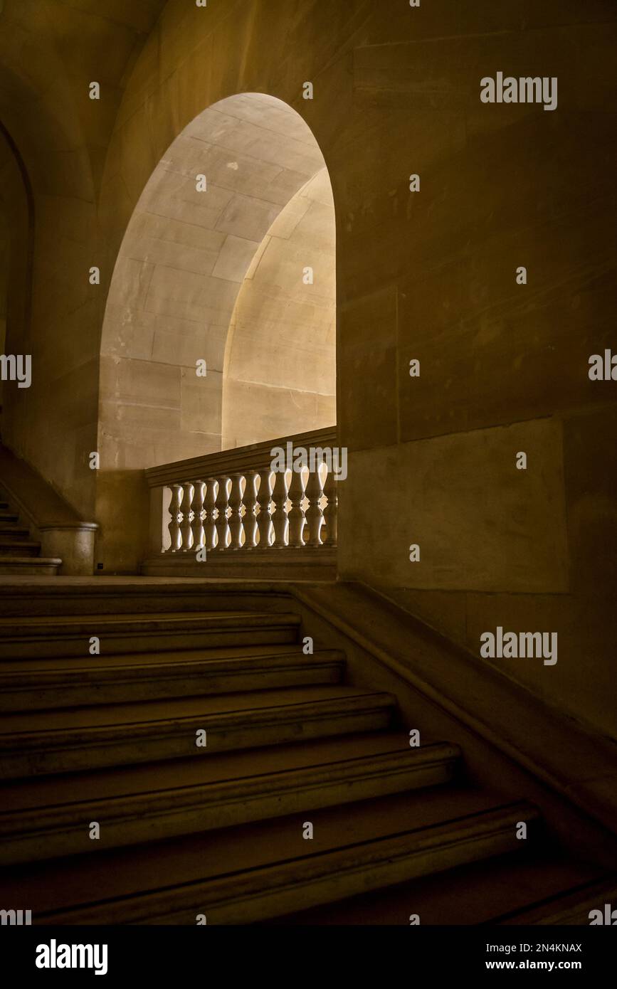 Architectural detail of an arch and balustrade, Louvre Museum, the ...