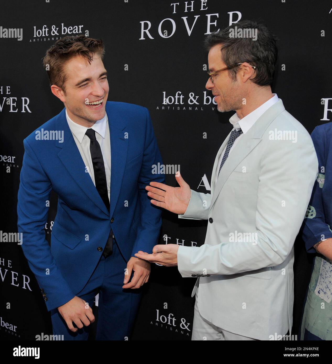 Robert Pattinson, left, and Guy Pearce, cast members in "The Rover ...