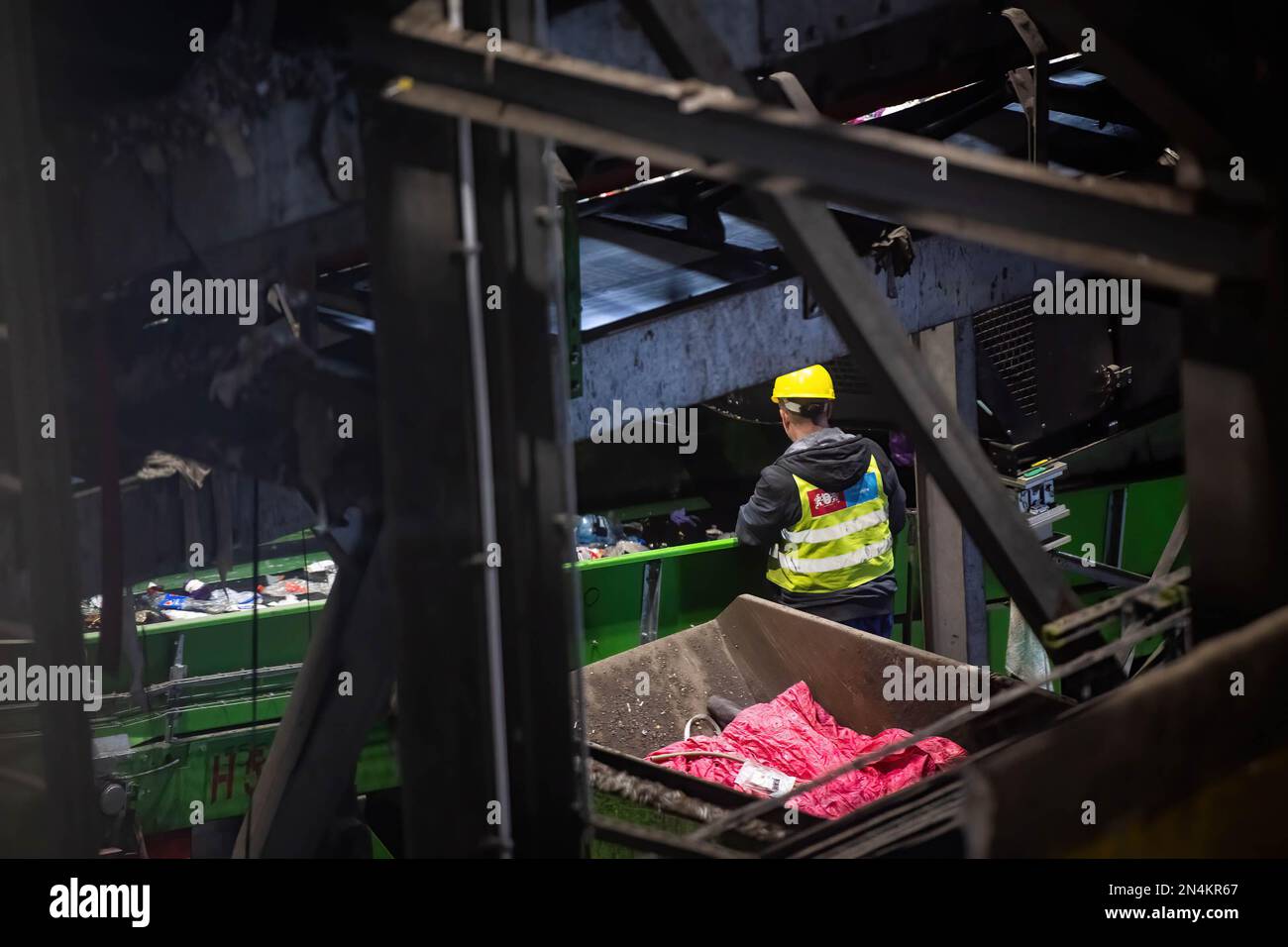 A sorting worker seen inspecting a sorting line at the modernized waste ...