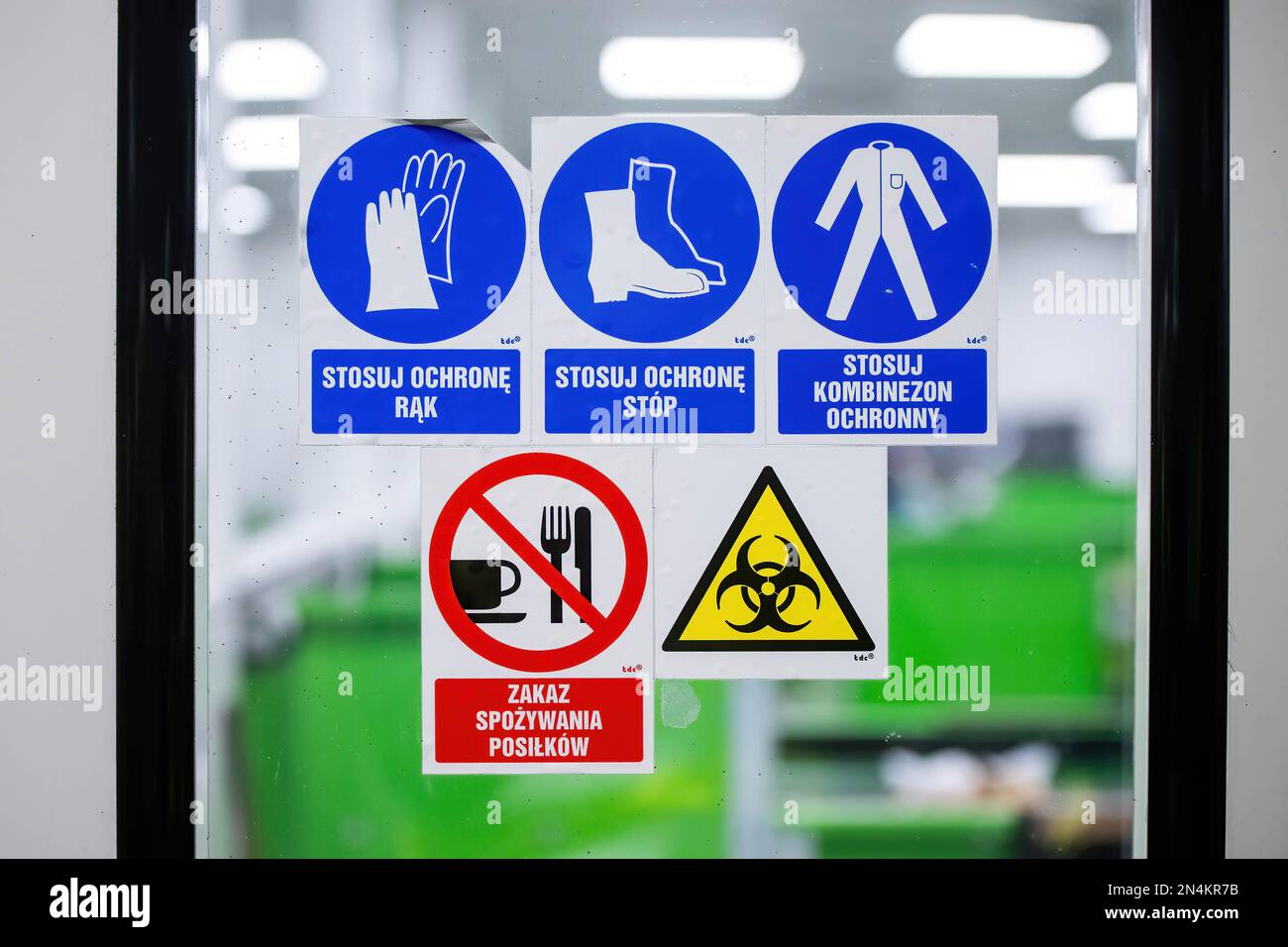 Health and safety signs are seen at the modernized waste sorting plant ...
