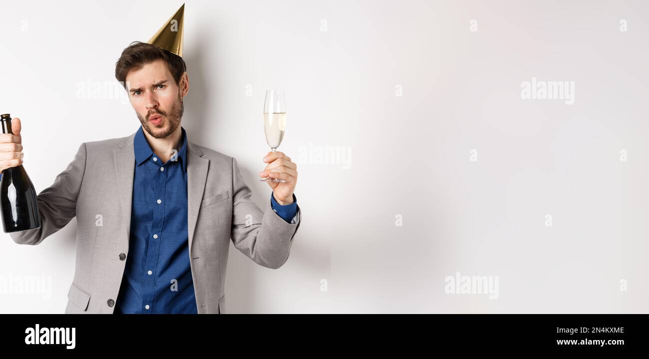 Celebration and holidays concept. Happy man in suit having fun at party ...