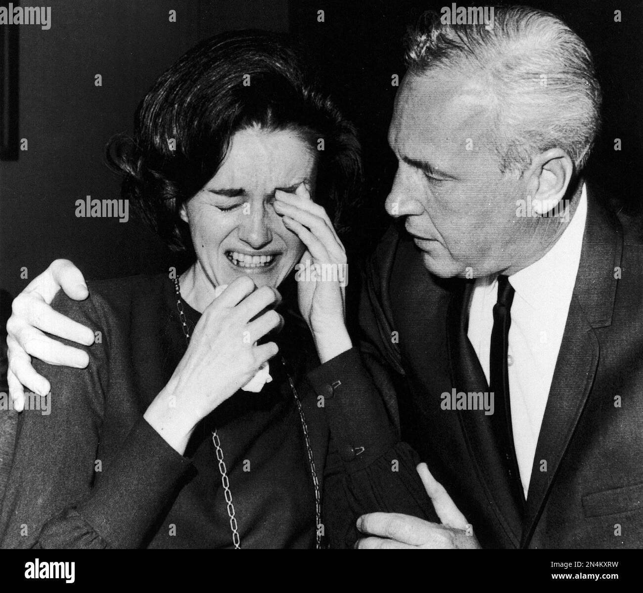 Lucille Miller, seated at the counsel table at the open of her murder ...
