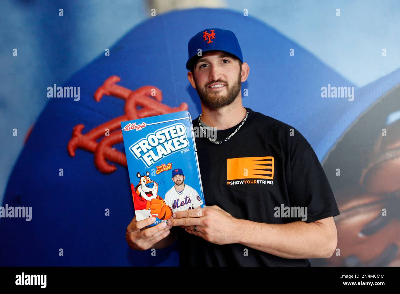 New York Mets player Jonathan Niese poses with his custom cereal box at ...
