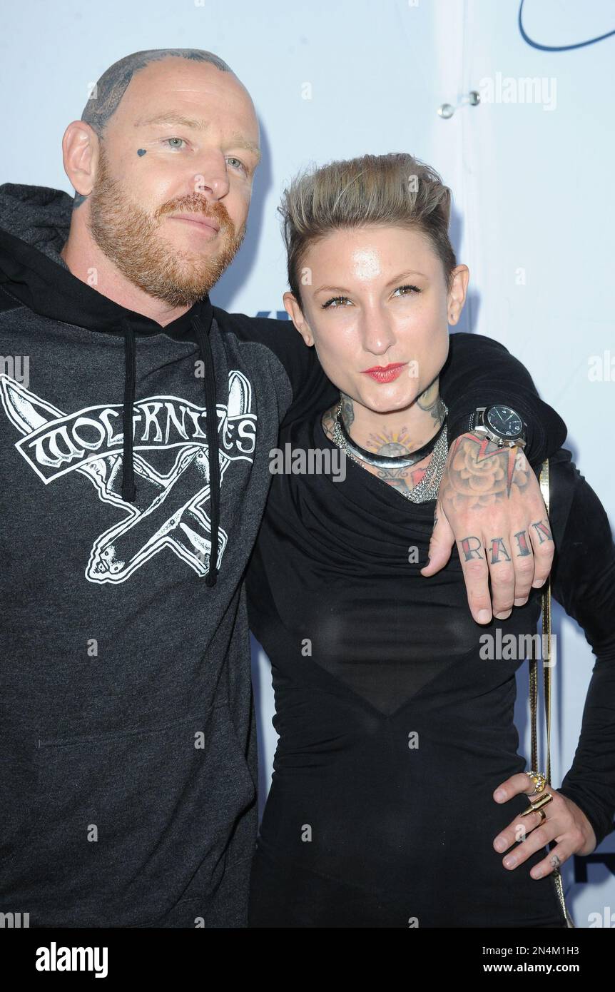 Jason Ellis, at left, and Katie Gilbert arrives at Pathway to the Cure ...