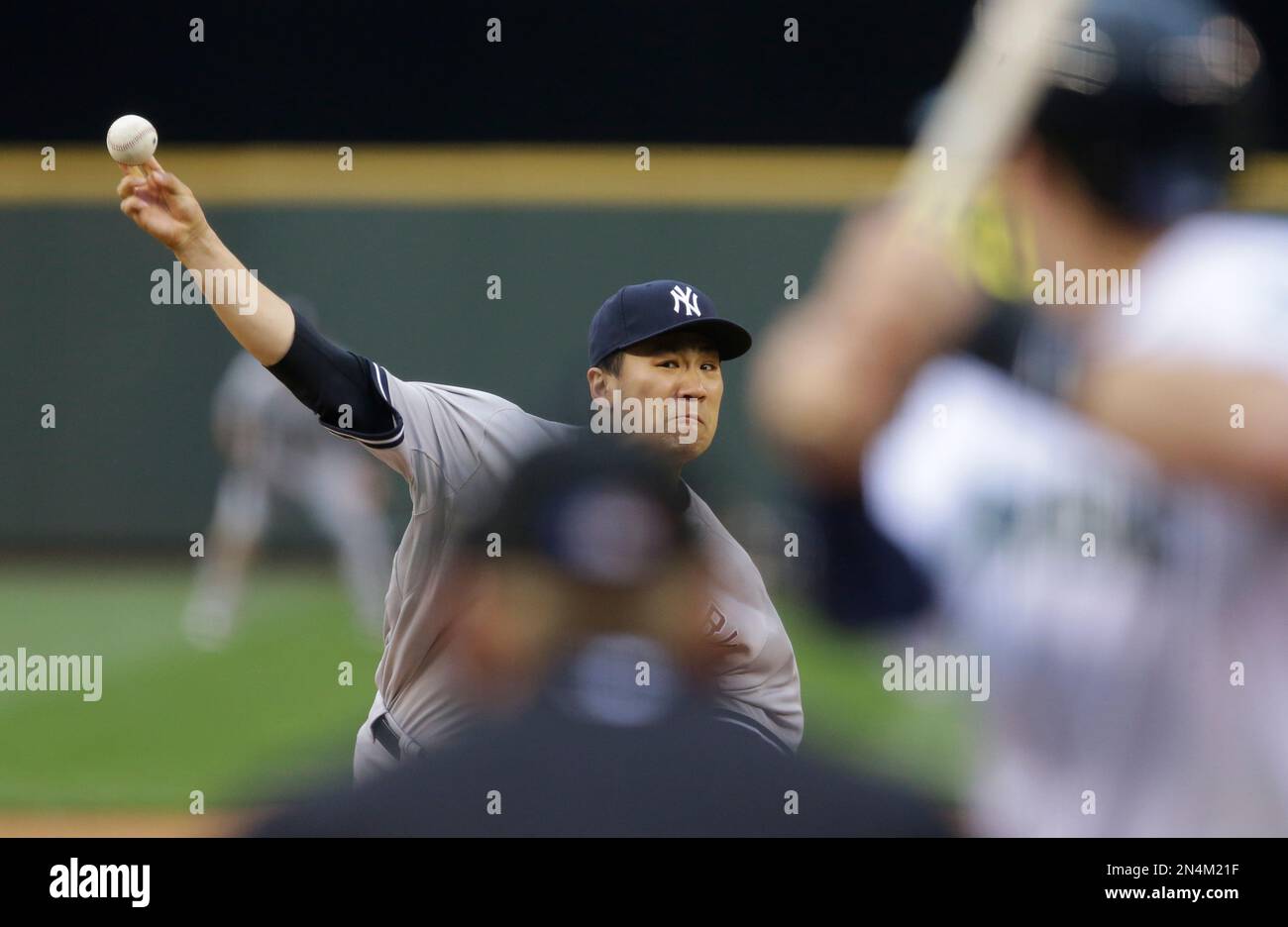 New York Yankees starting pitcher Masahiro Tanaka throws against the ...
