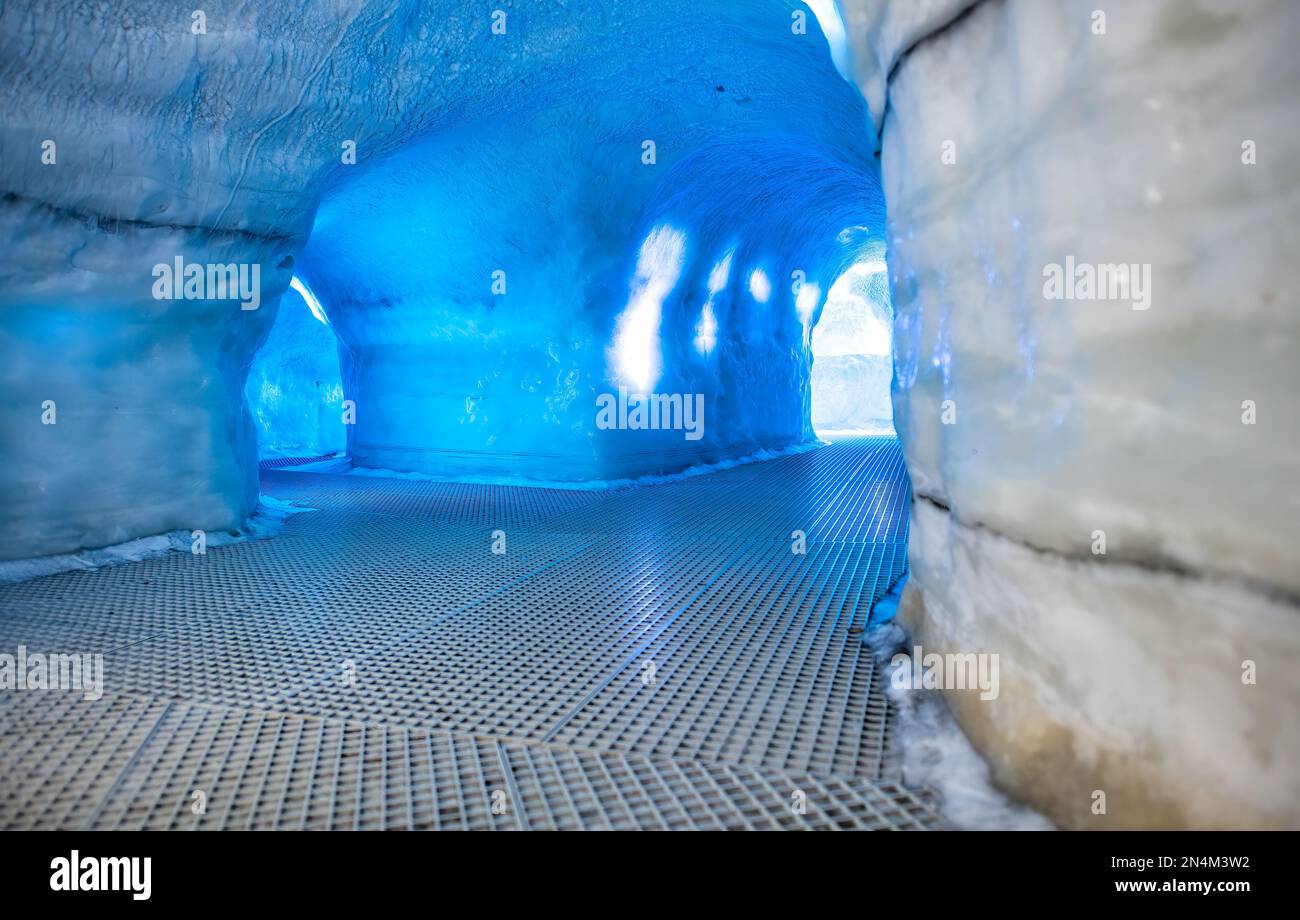Tunnel made by ice underground Stock Photo - Alamy