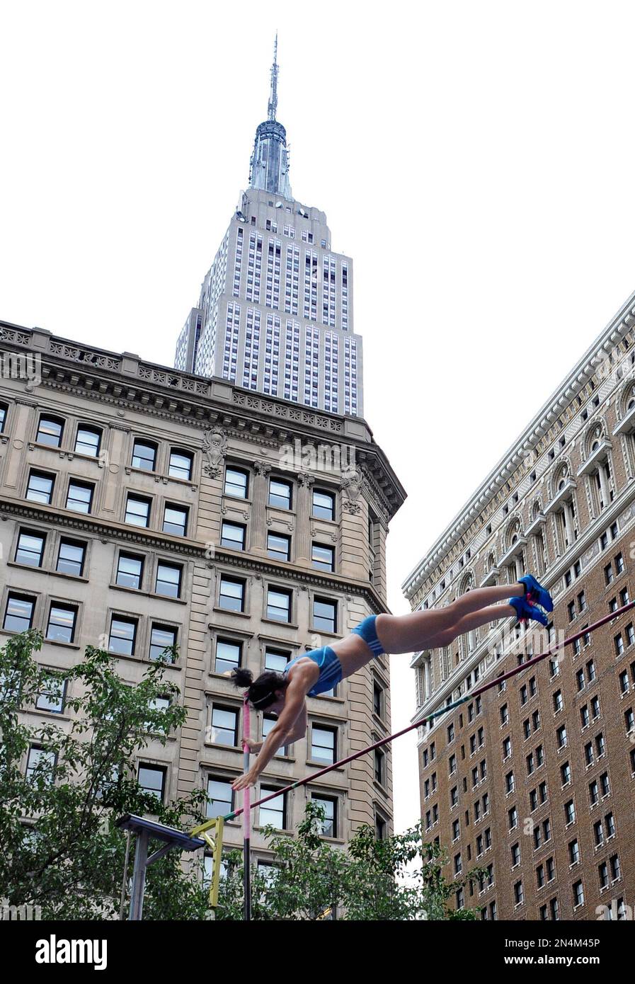 CORRECTS HEIGHT TO 14 FEET 6 INCHES - Olympic gold medalist Jenn Suhr ...