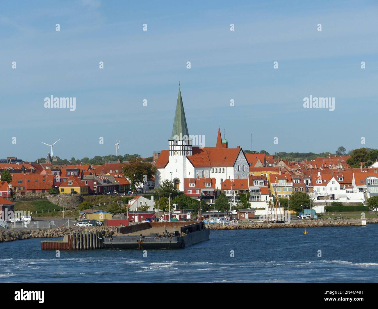 The coastline and buildings at Bornholm Island on a blue sky background ...