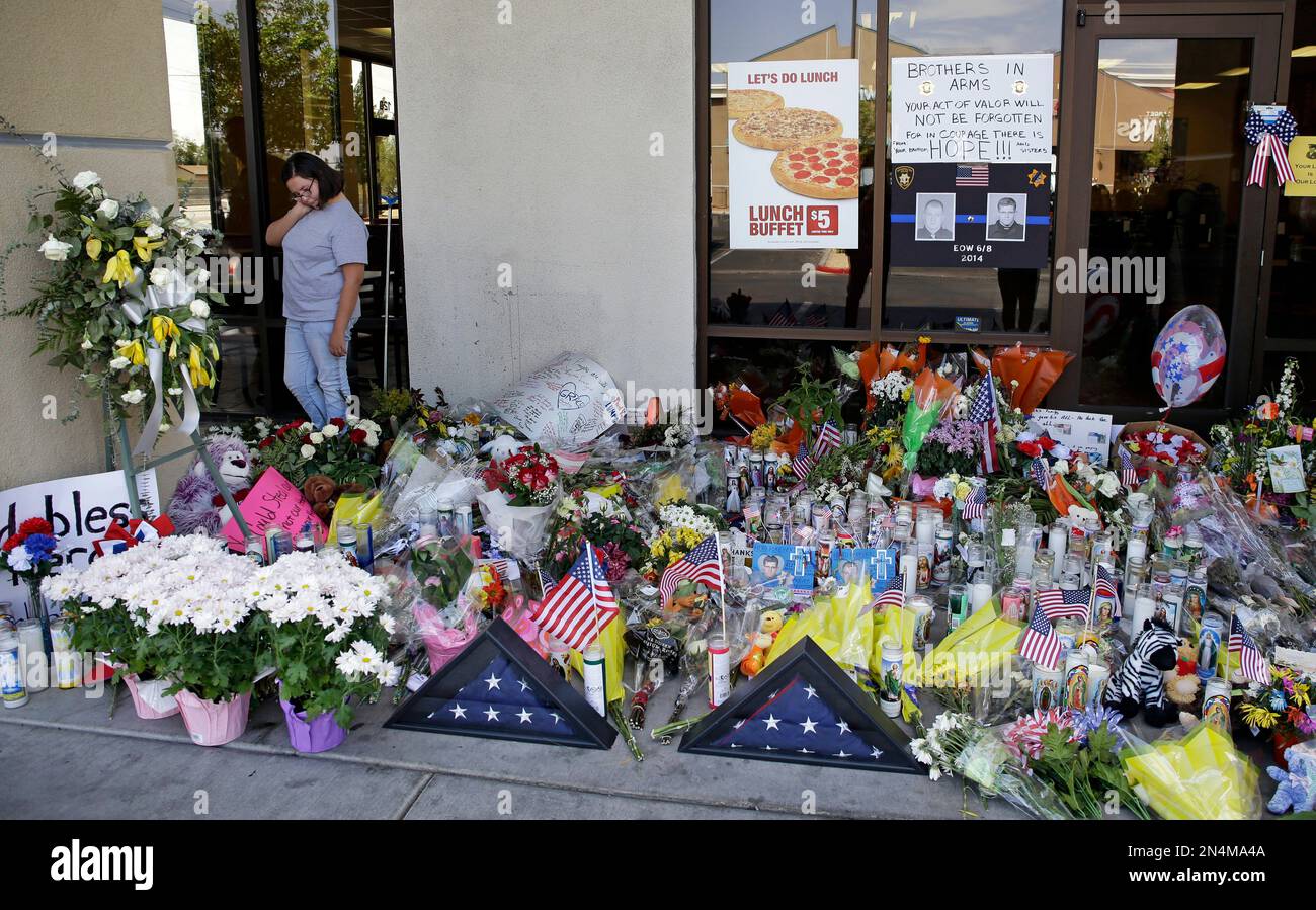 A makeshift memorial continues to grow at a CiCi's Pizza, Tuesday, June ...
