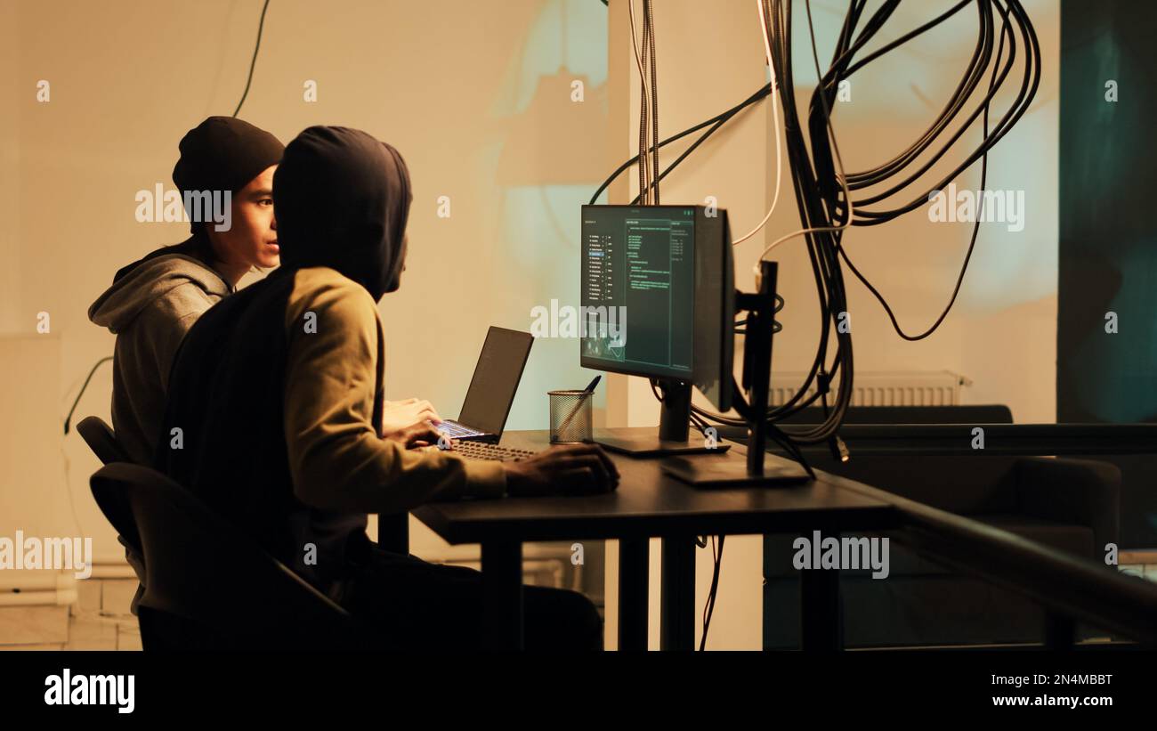 Spy using hacking concept and hacktivism for digital espionage, stealing important government ...