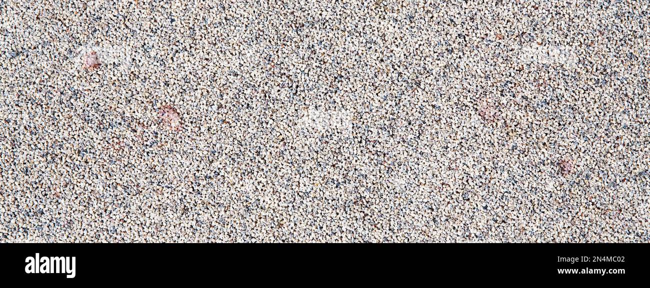 A panoramic shot of quartz sand epoxy decorative floor covering with ...