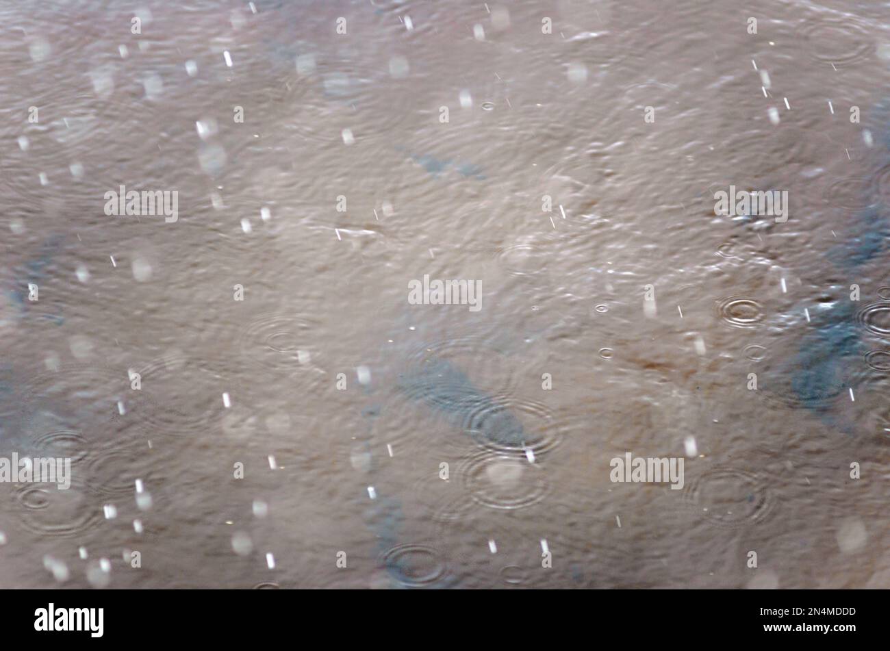 Photos of falling drops of hail and rain with rapid speed are broken on ...