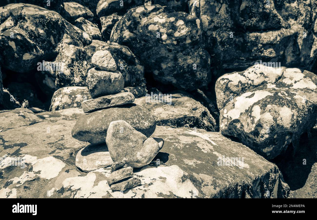 Stacked stones as a guide for hikers in Table Mountain National Park in ...