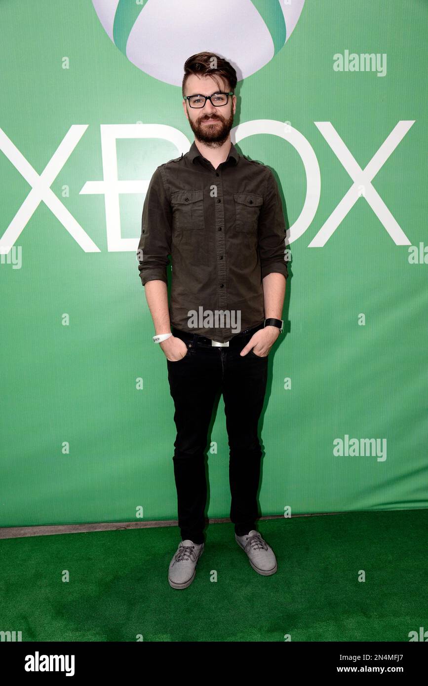 A developer walks the green carpet at the Xbox E3 2014 Media Briefing ...