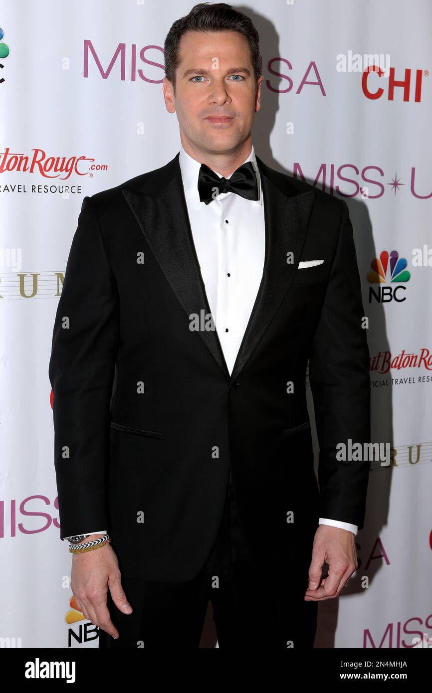 Thomas Roberts poses during a red carpet event before the Miss USA 2014 ...