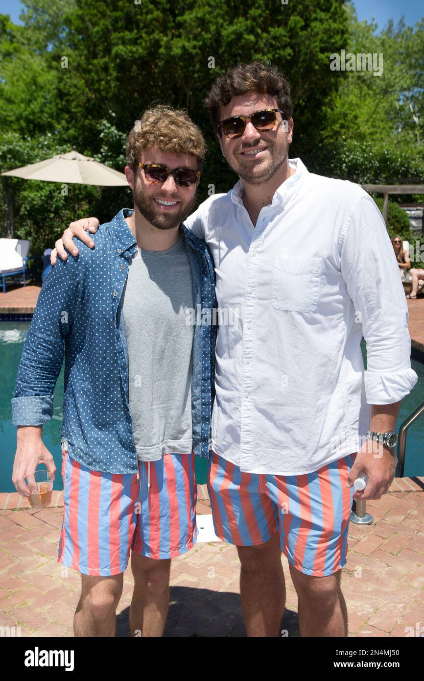 Solid & Striped founder Isaac Ross, right, poses for a photograph with ...
